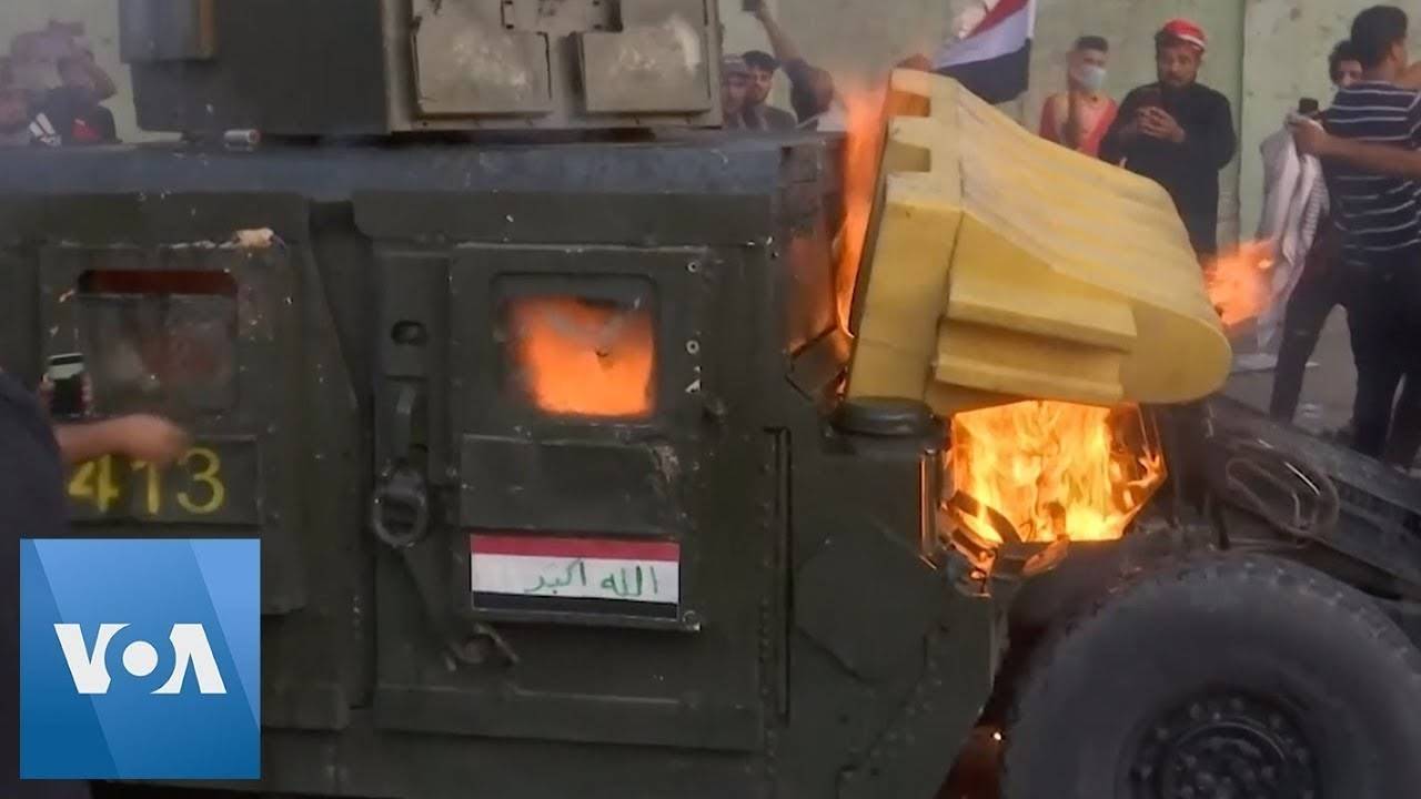 Iraqi Protesters Burn Humvee in Third Day of Protests - VOA | Vidio